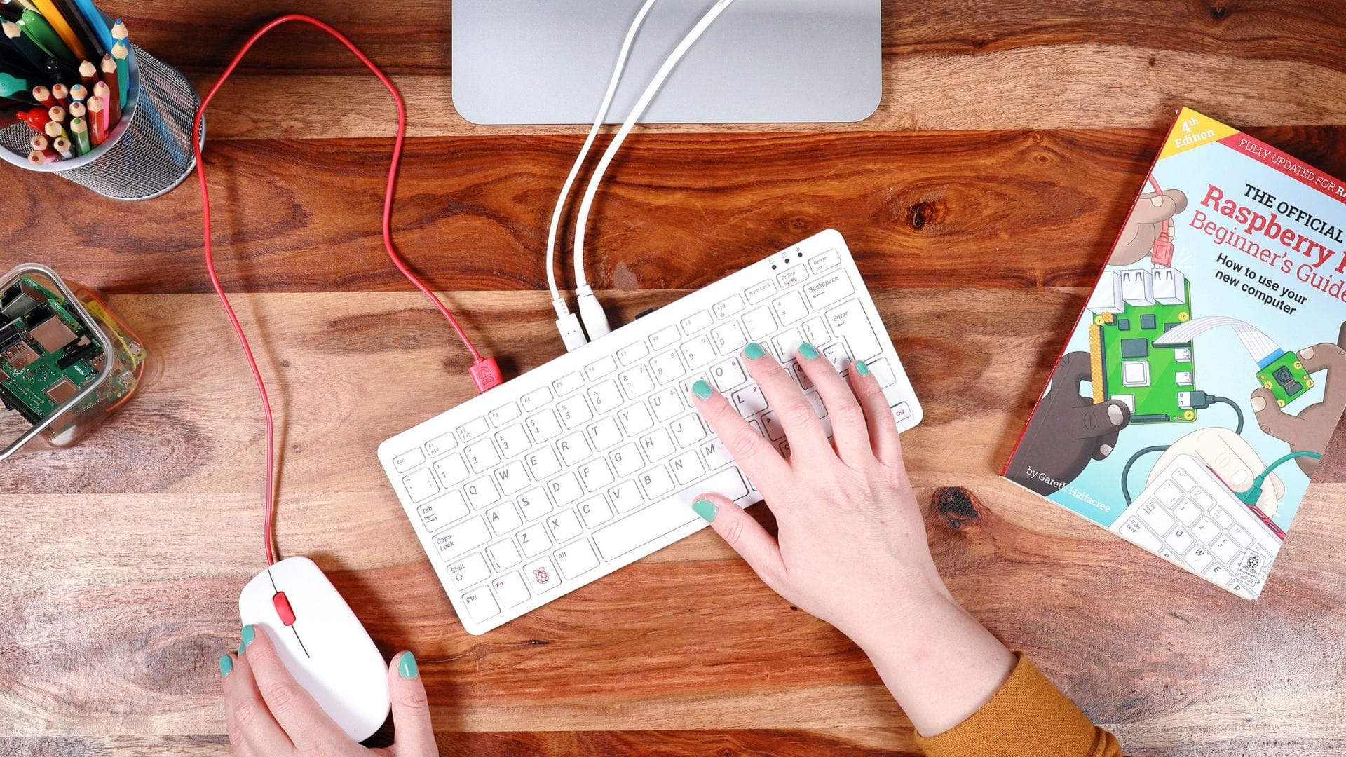 Raspberry Pi unveils upgraded keyboard computer with mechanical switches and SSD storage - Tech ...